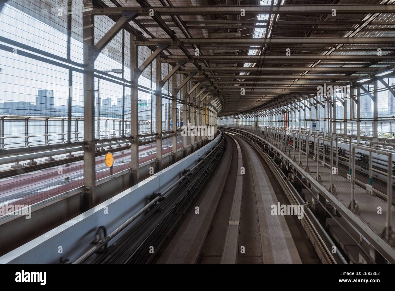 tunnel of monorail road view from front window of a moving train ...