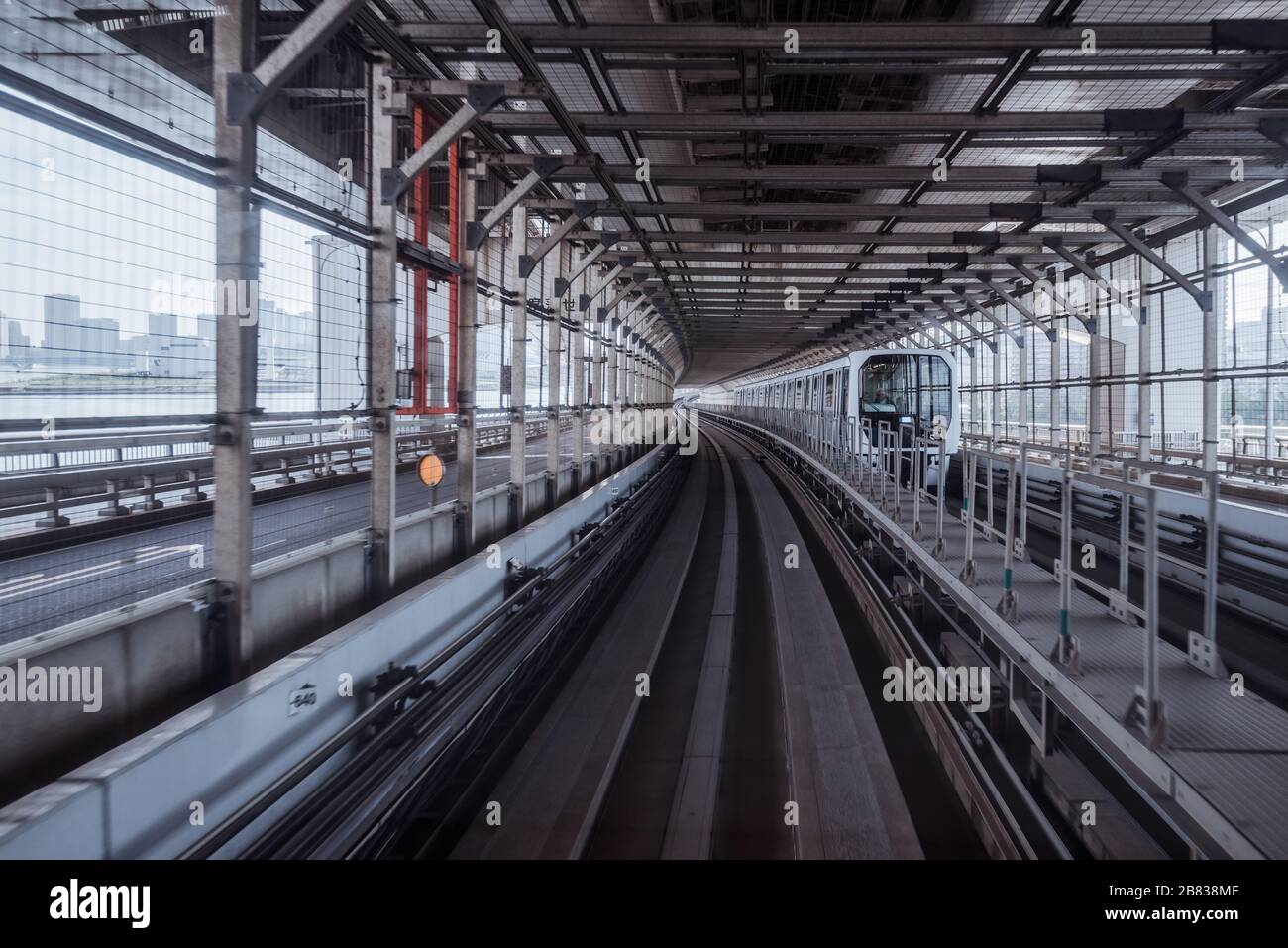 tunnel of monorail road view from front window of a moving train ...
