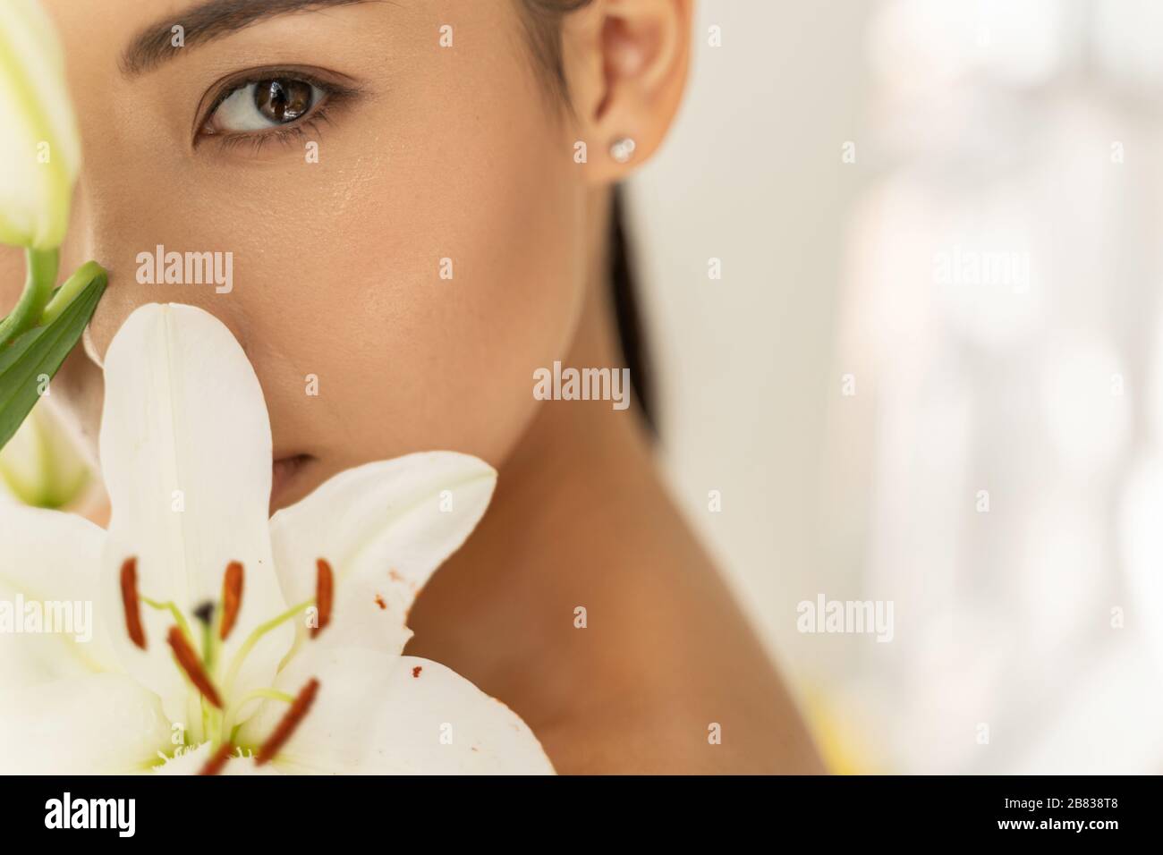 Asian Woman Smelling Flowers High Resolution Stock Photography and ...