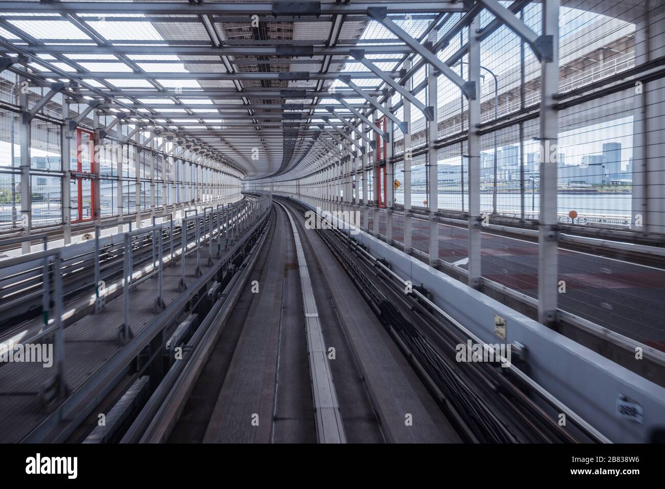 tunnel of monorail road view from front window of a moving train ...