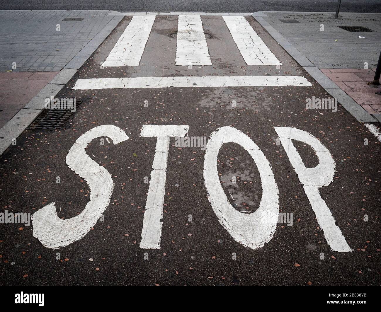 STOP is a traffic sign designed to notify drivers that they must come ...