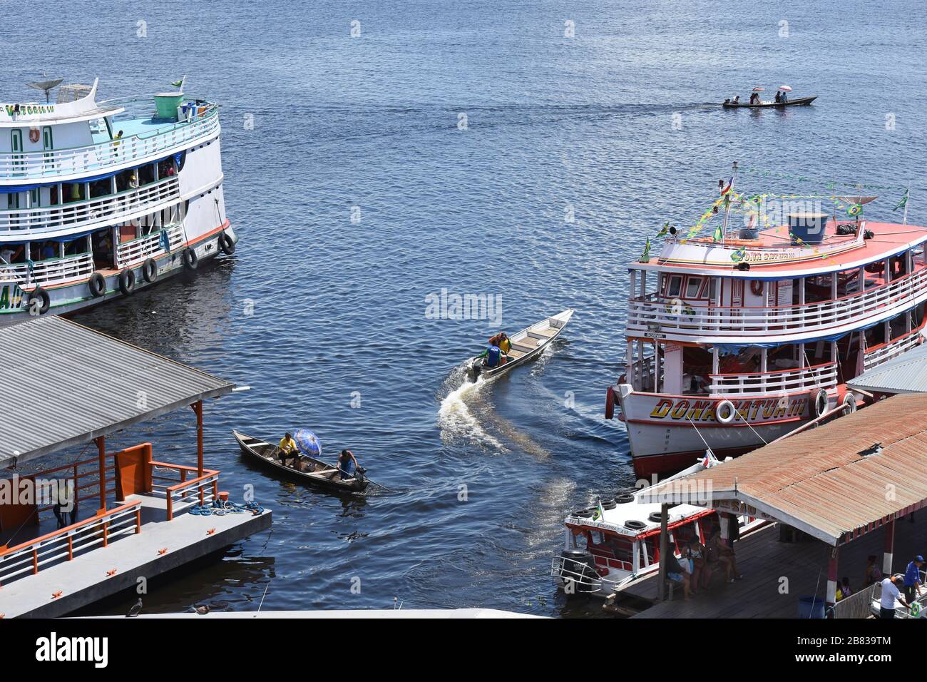 Boats on the waterfront of the river port of Tefé situated on Lake Tefé ...
