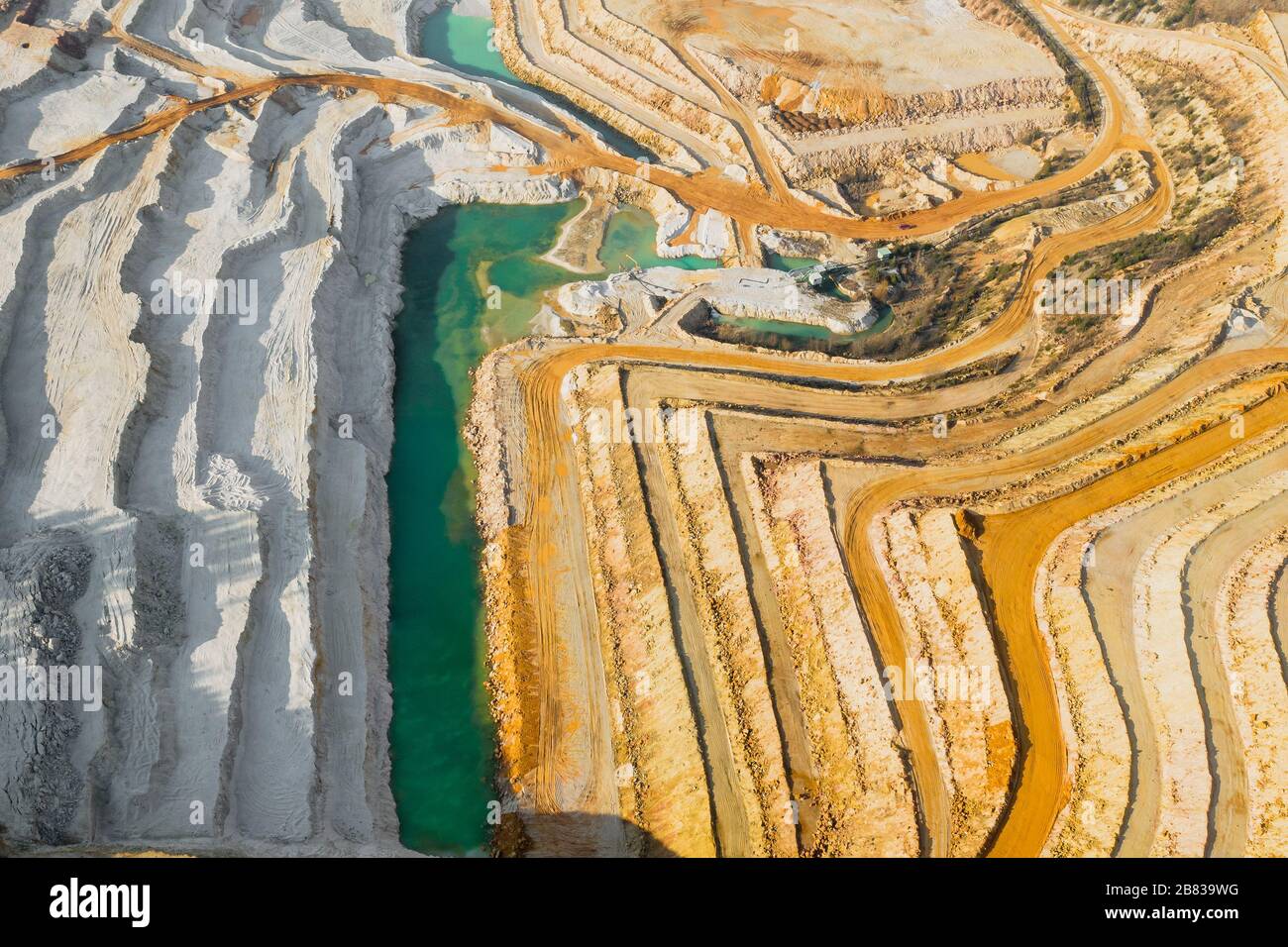 Top view on a sand quarry. Arial view on a mining of natural resources ...