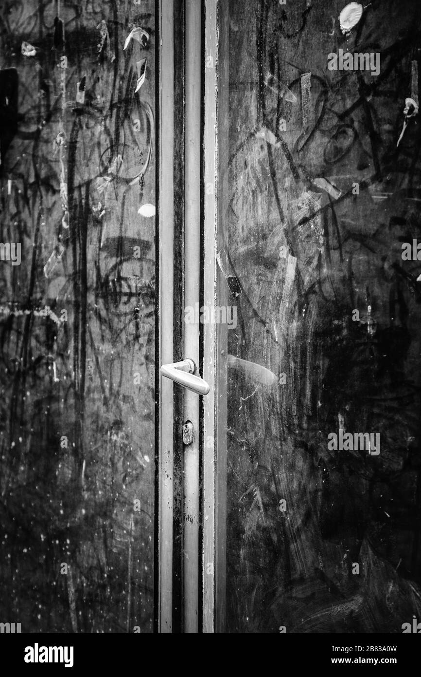 Abandoned glass door, detail of dirt and debris Stock Photo - Alamy