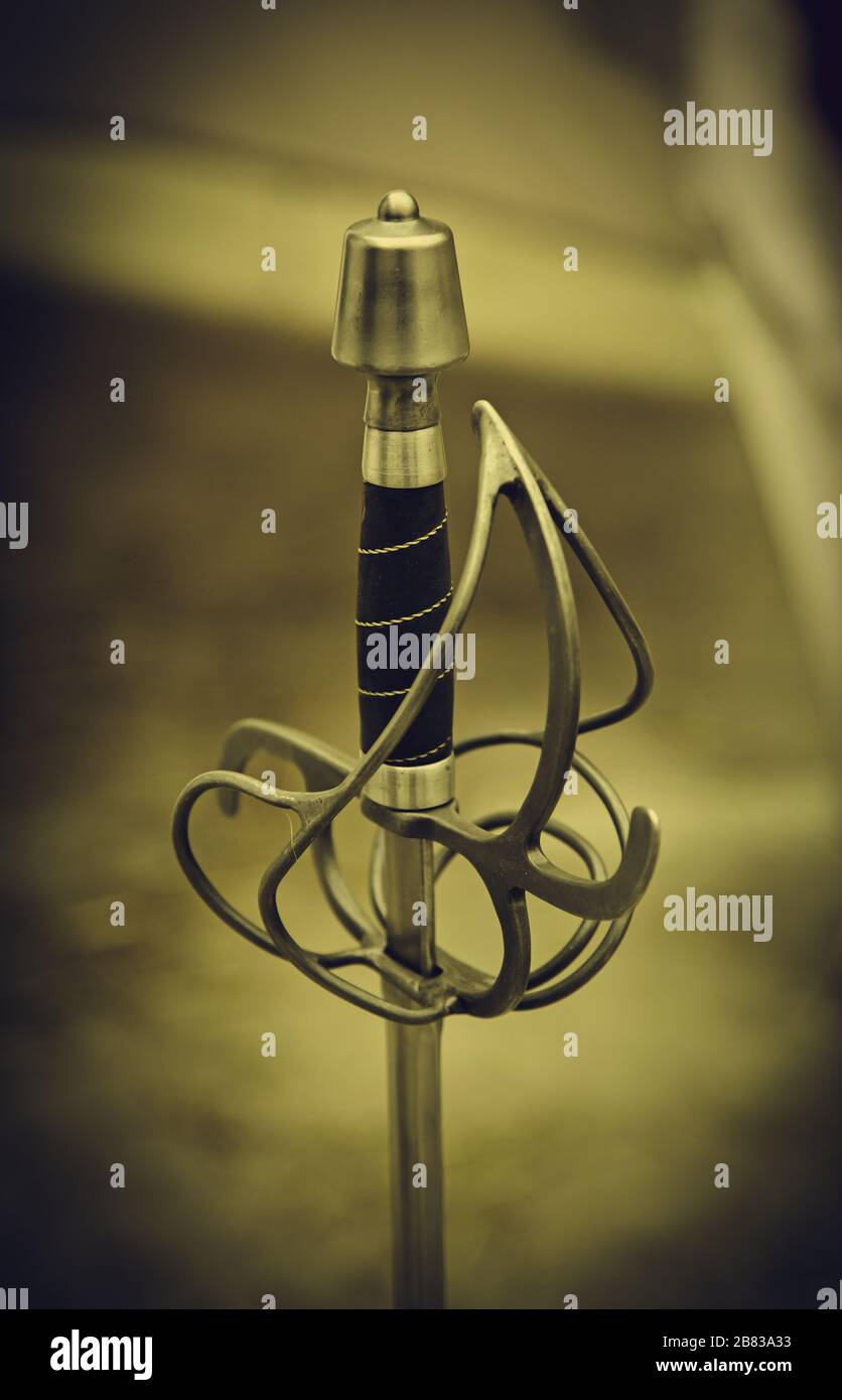 Medieval sword handle, detail of an old medieval sword, ancient weapon ...