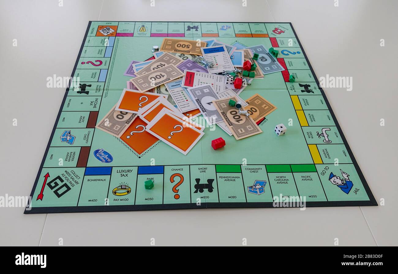 Orlando, FL/USA-12/20/19: Pieces for the game Monopoly by Hasbro on a ...