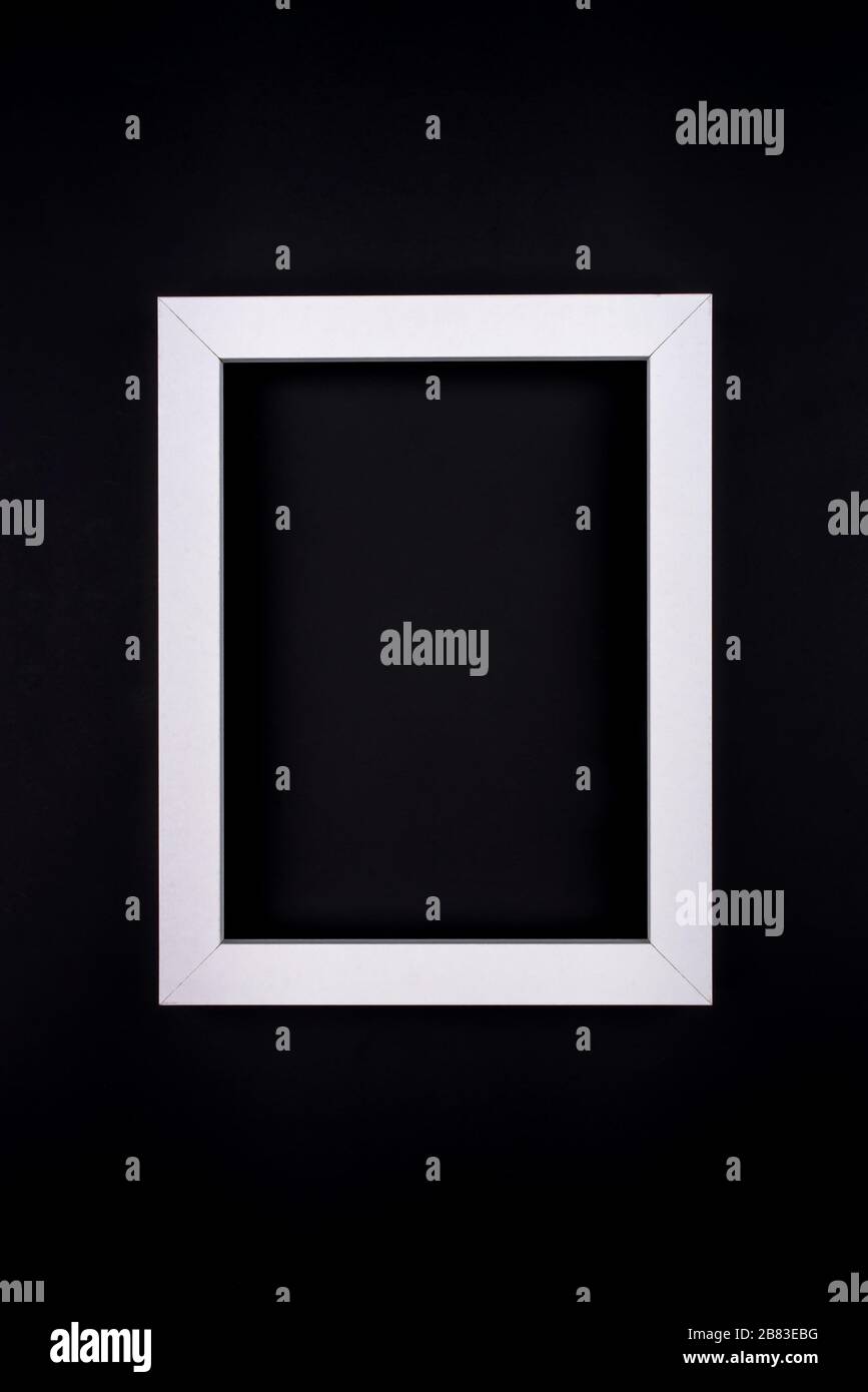 White text frame on a black background Stock Photo - Alamy
