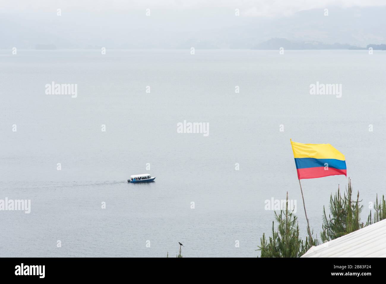 Lake Tota, Boyaca / Colombia: April 7, 2018: Colombian flag and tourist ...