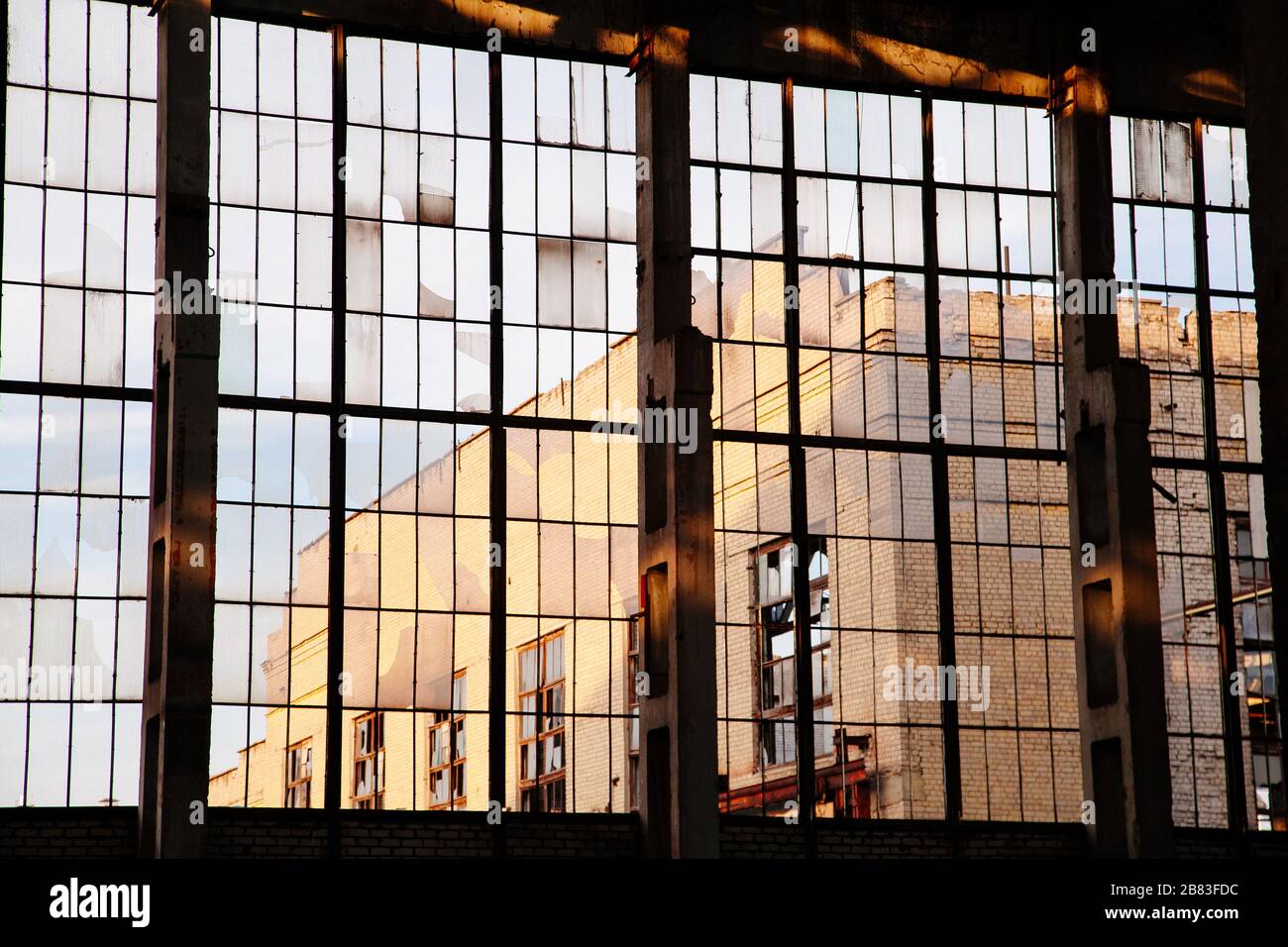 Old broken glass windows at abandoned factory Stock Photo - Alamy