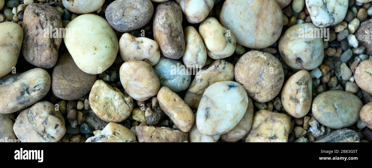 Stone wall rounded stones hi-res stock photography and images - Alamy