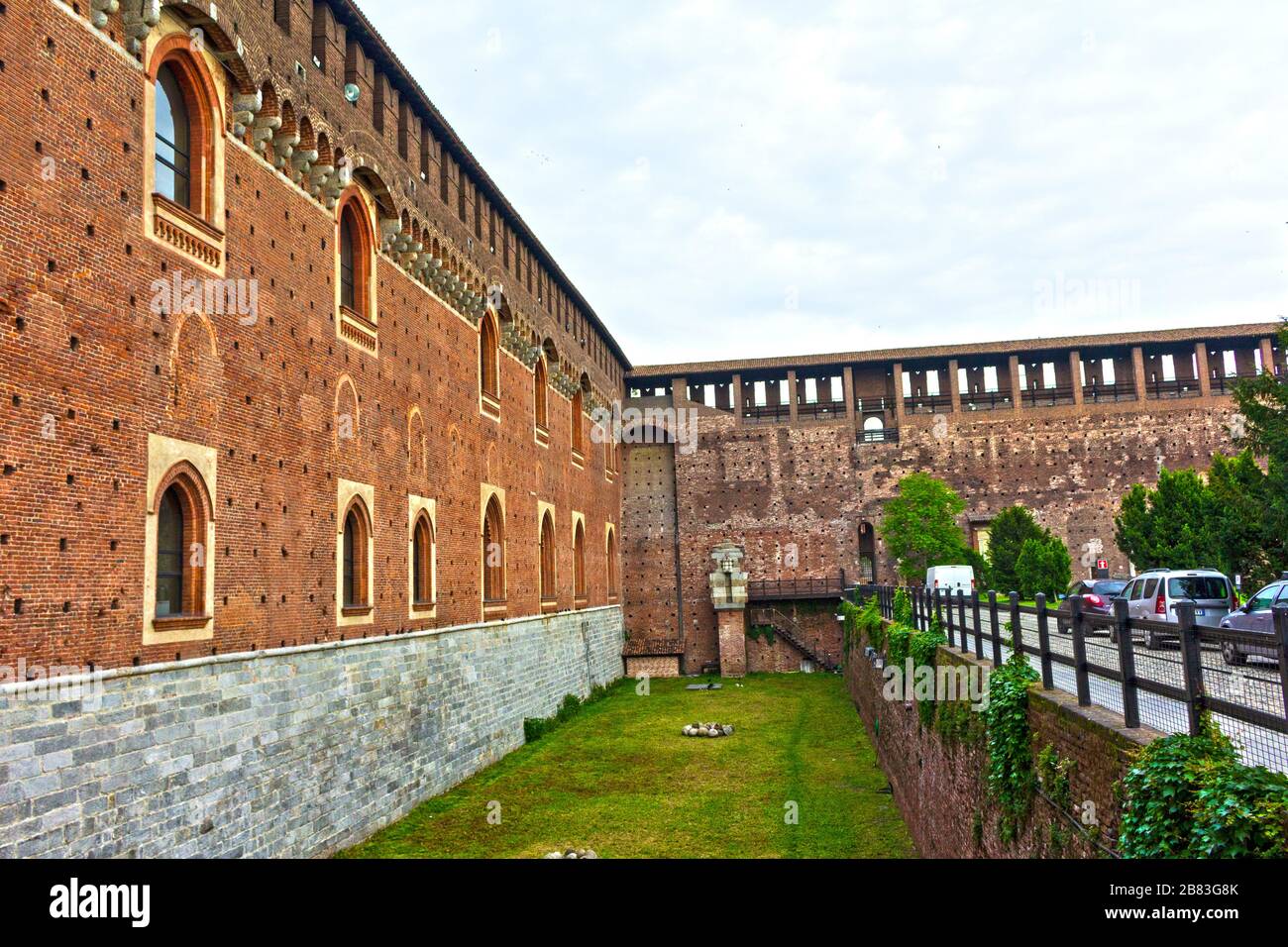 View of the Sforza castle in the historical center of Milan on rainy ...