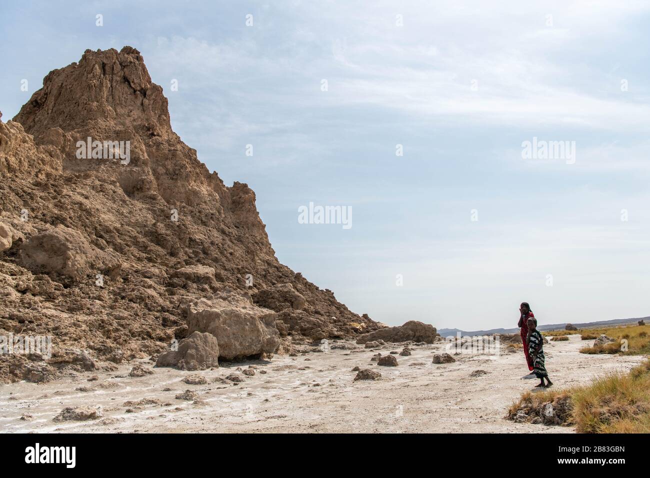 Africa, Djibouti, Lake Abbe. Landscape view of lake Abbe Two children ...