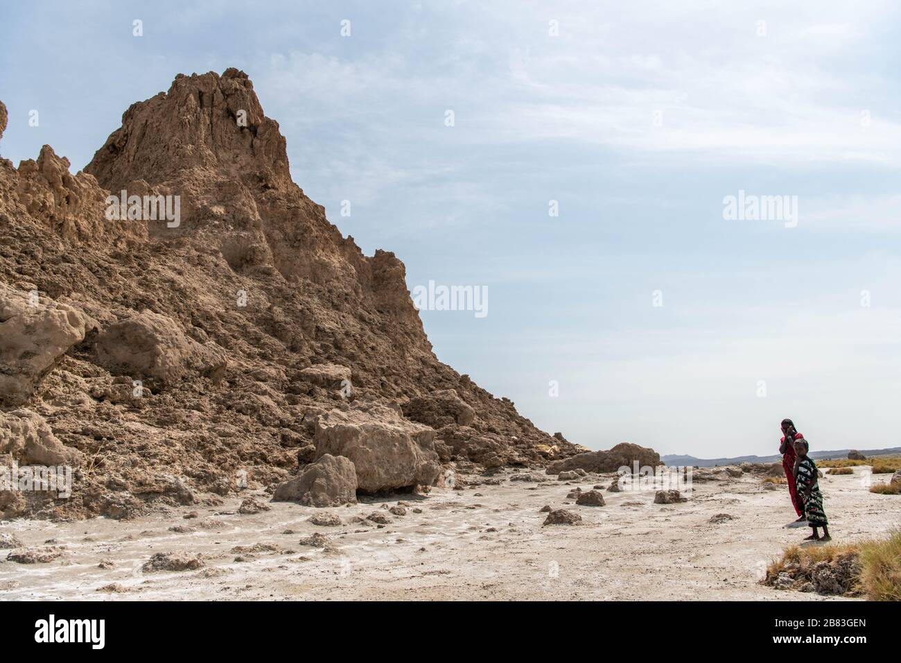 Africa, Djibouti, Lake Abbe. Landscape view of lake Abbe Two children ...