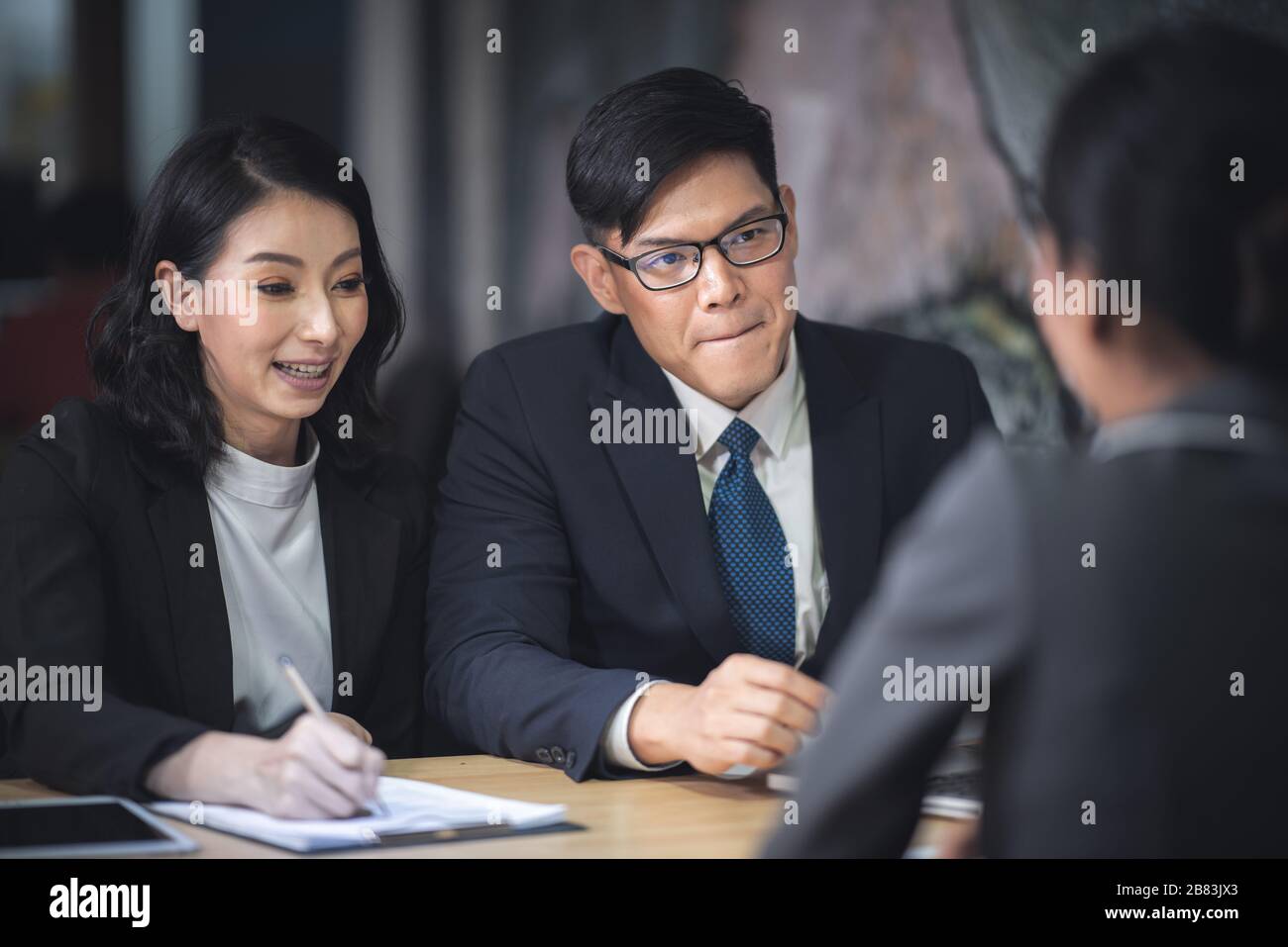 Successful job interview with boss and employee Stock Photo - Alamy