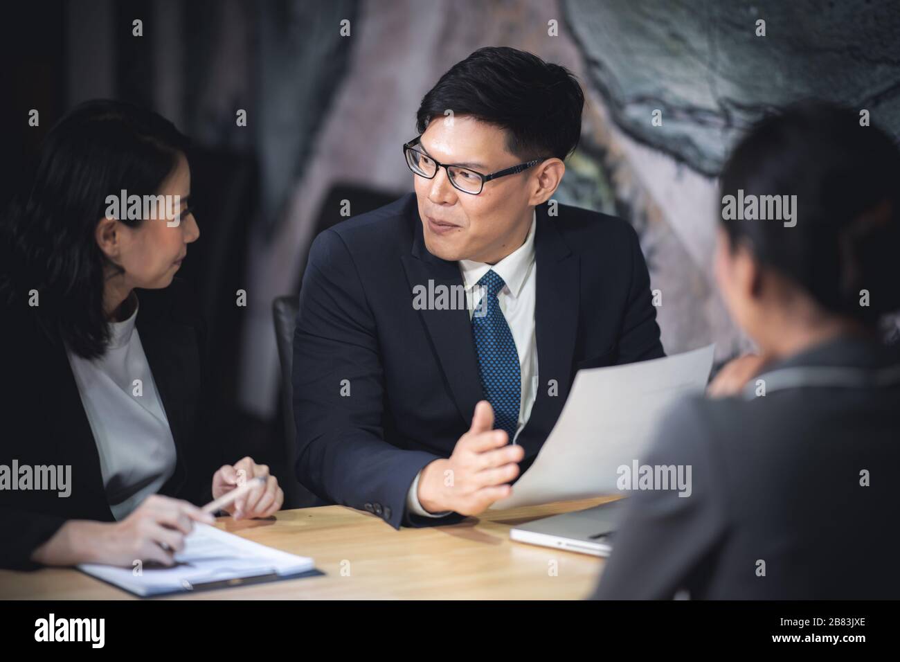 Successful job interview with boss and employee Stock Photo - Alamy