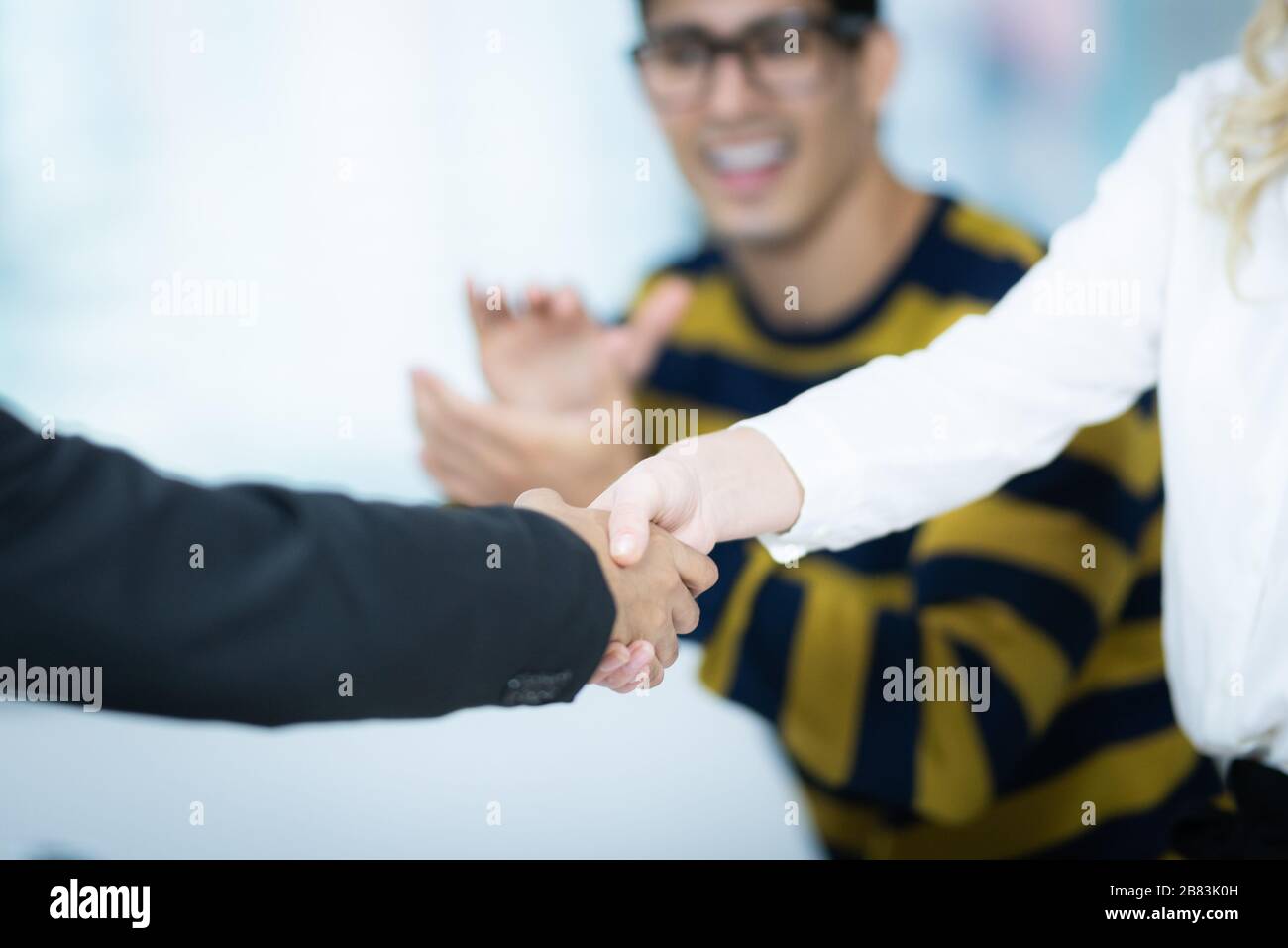 A group of business people are enjoying the success of doing business ...