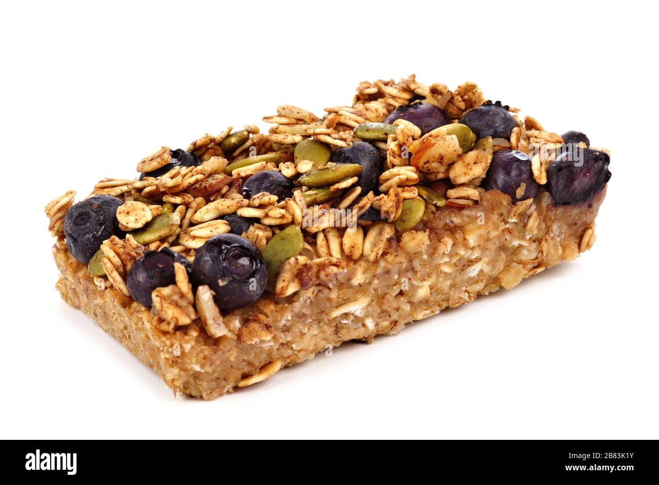 Homemade superfood breakfast bar with oats and blueberries isolated on ...