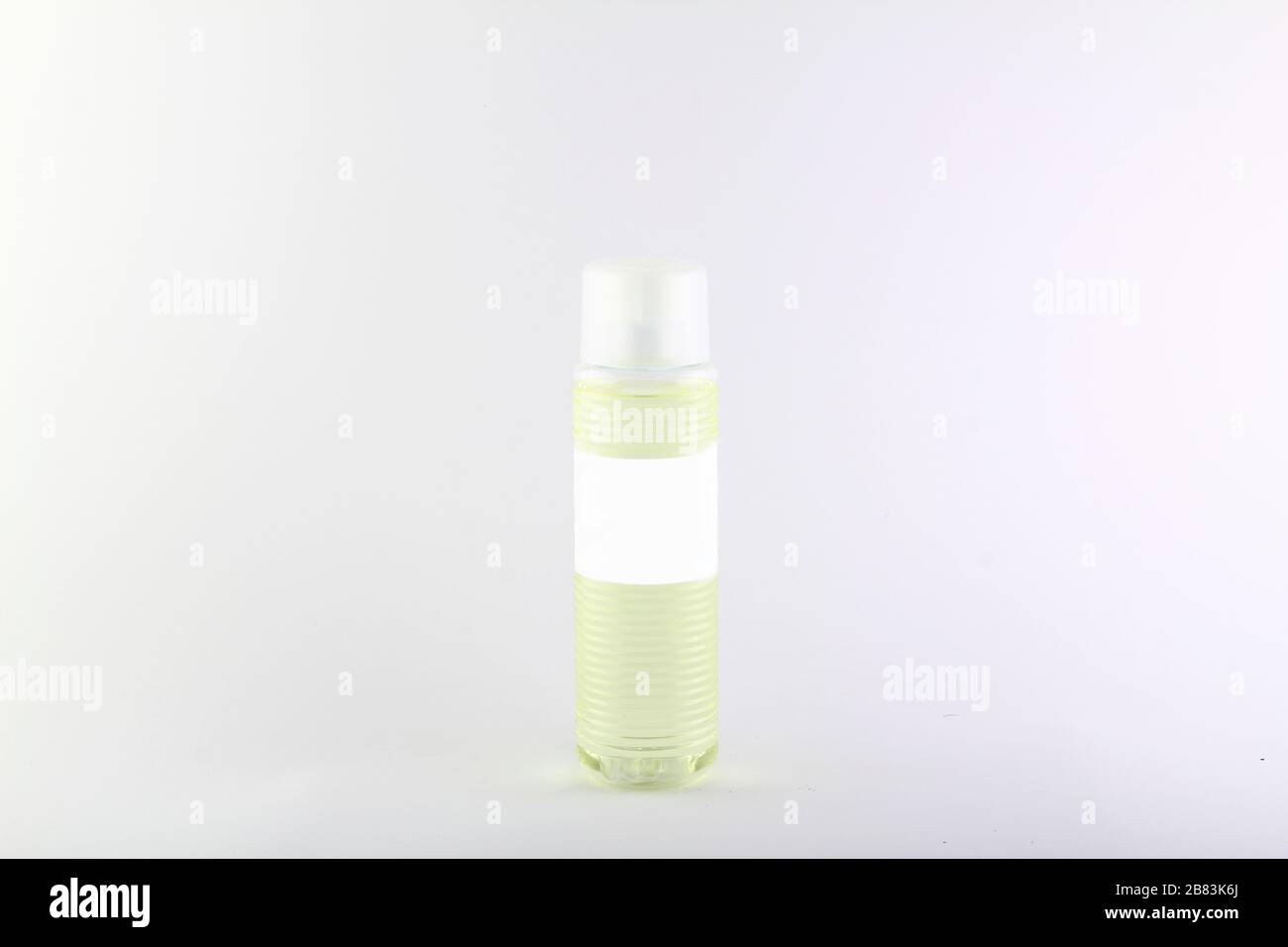 Bottle of cologne isolated over a white background Stock Photo - Alamy