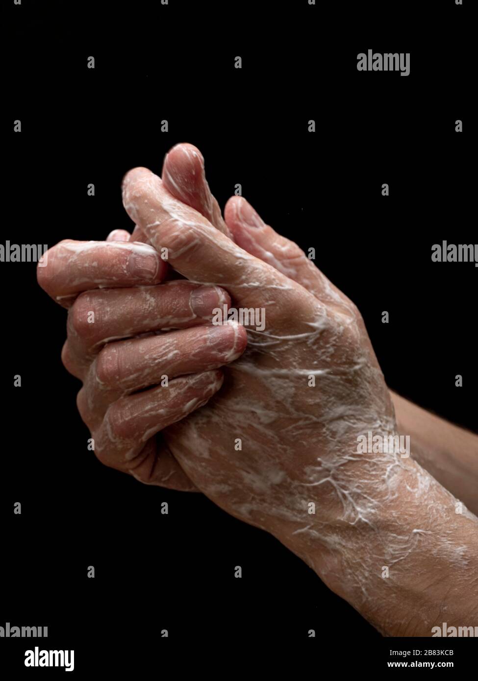 Young man is holding taking giving throwing a soap bottle for washing ...