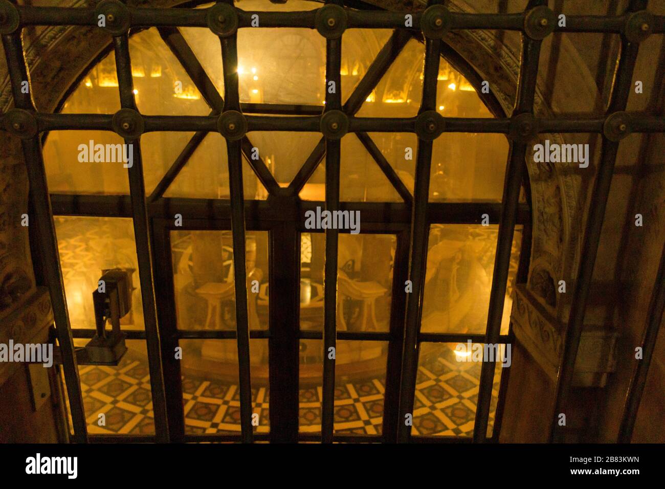 Old lattice window looking to the crypt of the Milan Cathedral (Duomo ...
