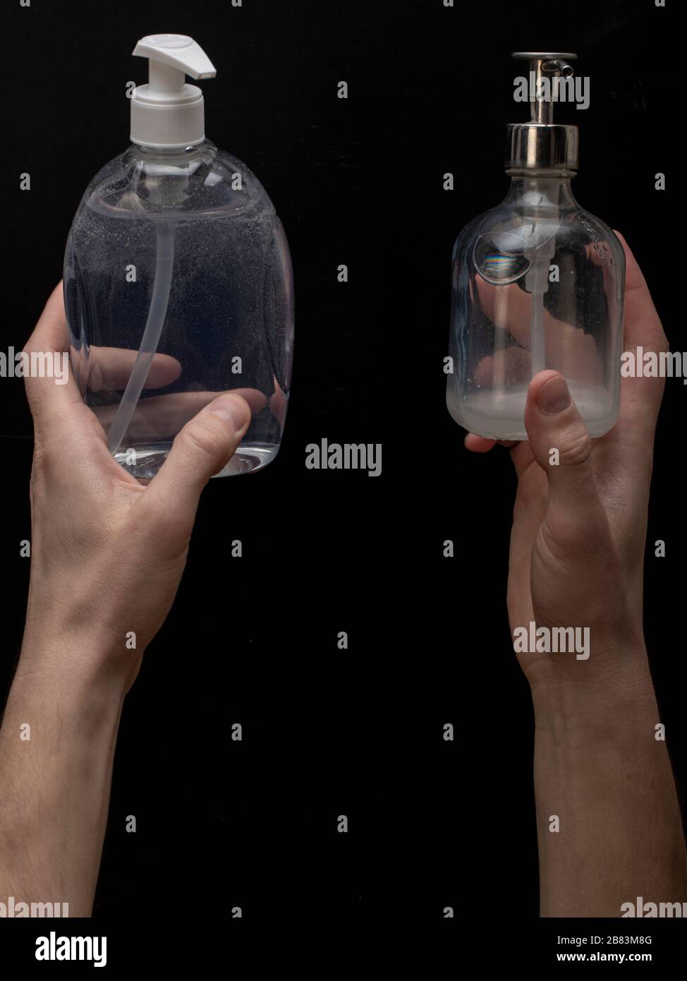 Young man is holding taking giving throwing a soap bottle for washing ...