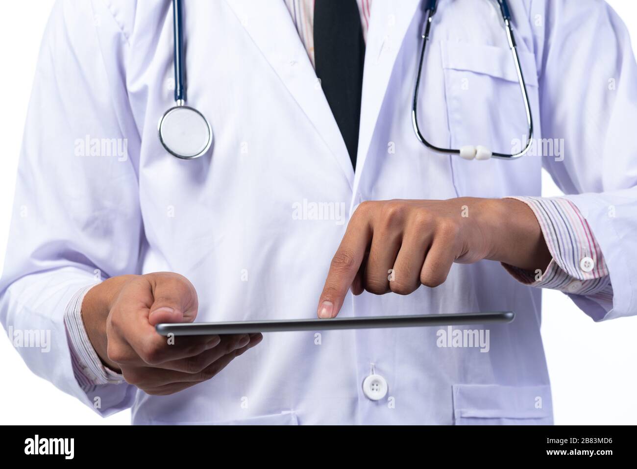 Doctors use tablets to analyze treatment outcomes and study medical ...