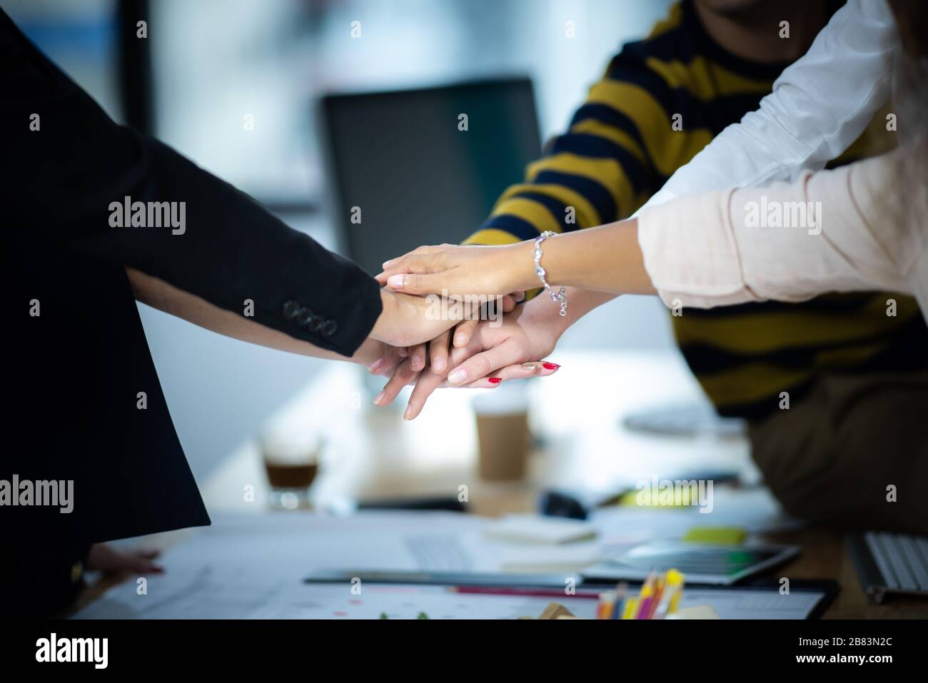 A group of business people are enjoying the success of doing business ...