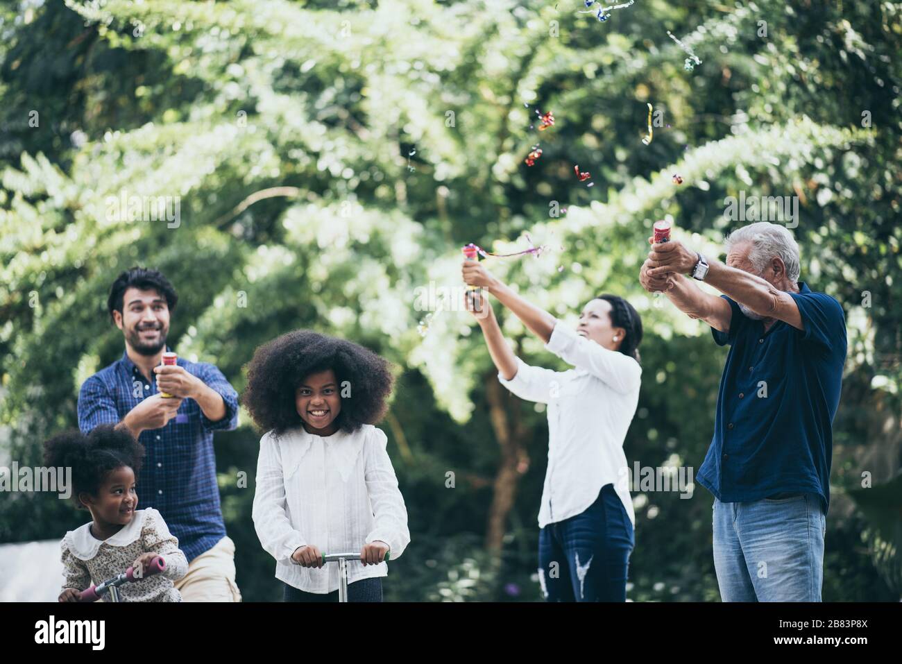 Happy people family concept laugh and have fun together with three ...