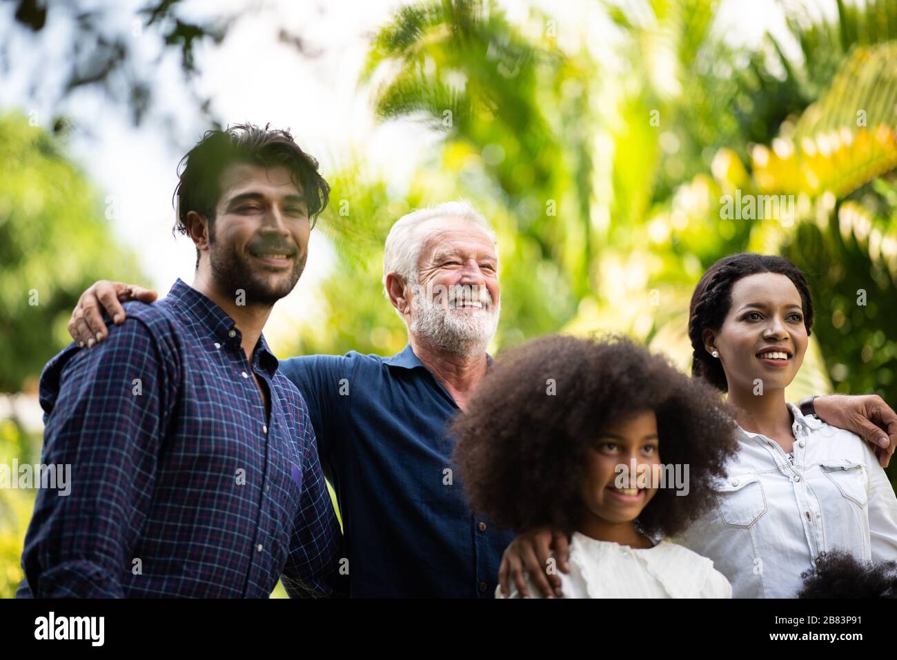 Happy people family concept laugh and have fun together with three ...