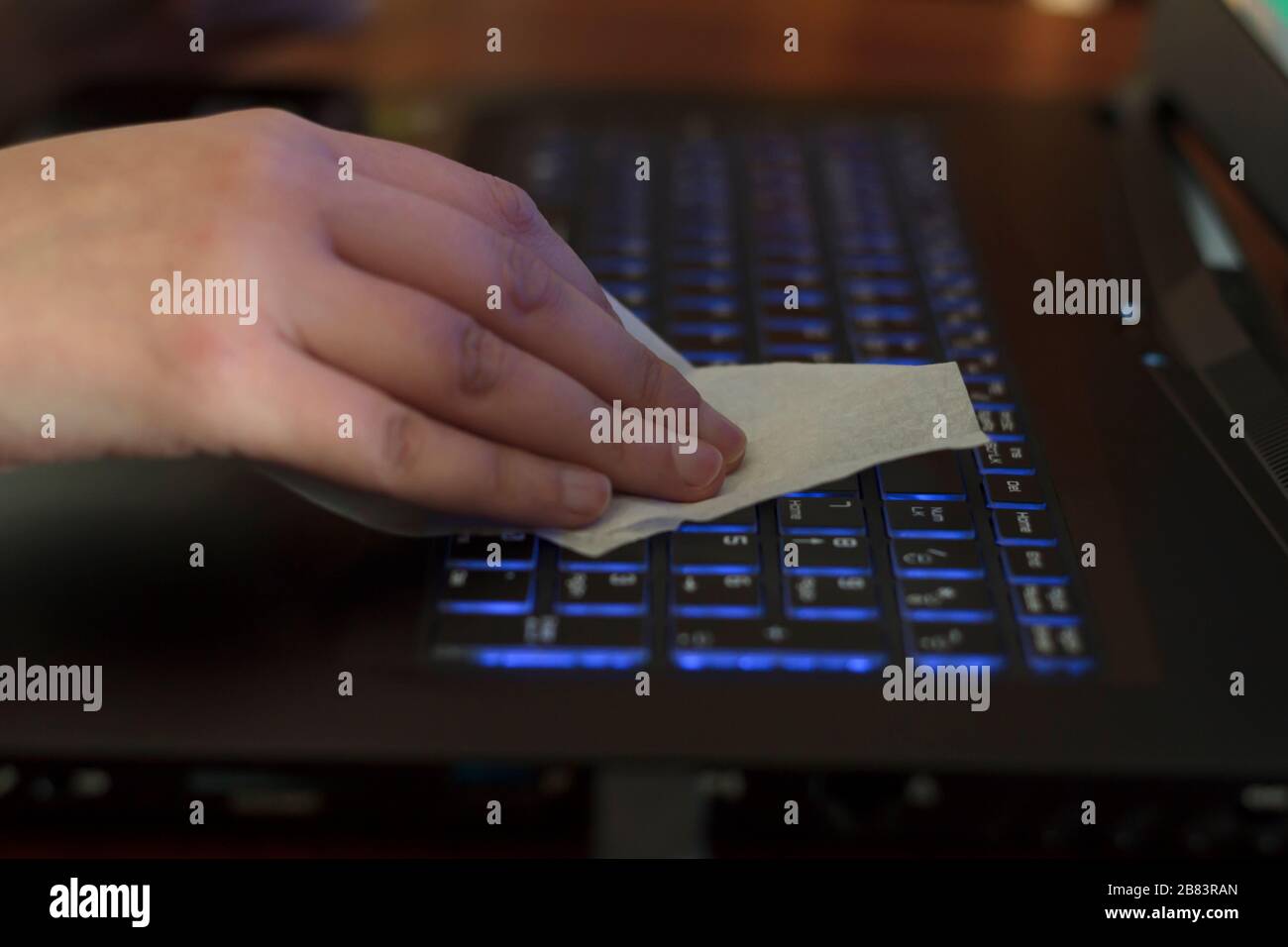 Clean and disinfect computer keyboard. Germs, bacteria, Covid-19 ...