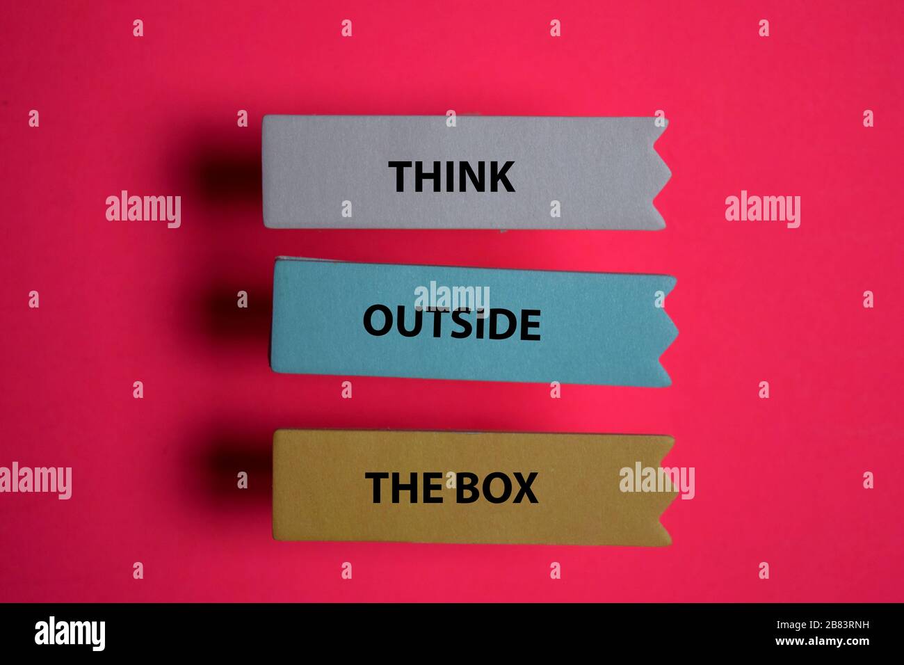 Think Outside The Box write on a sticky note isolated on Office Desk ...