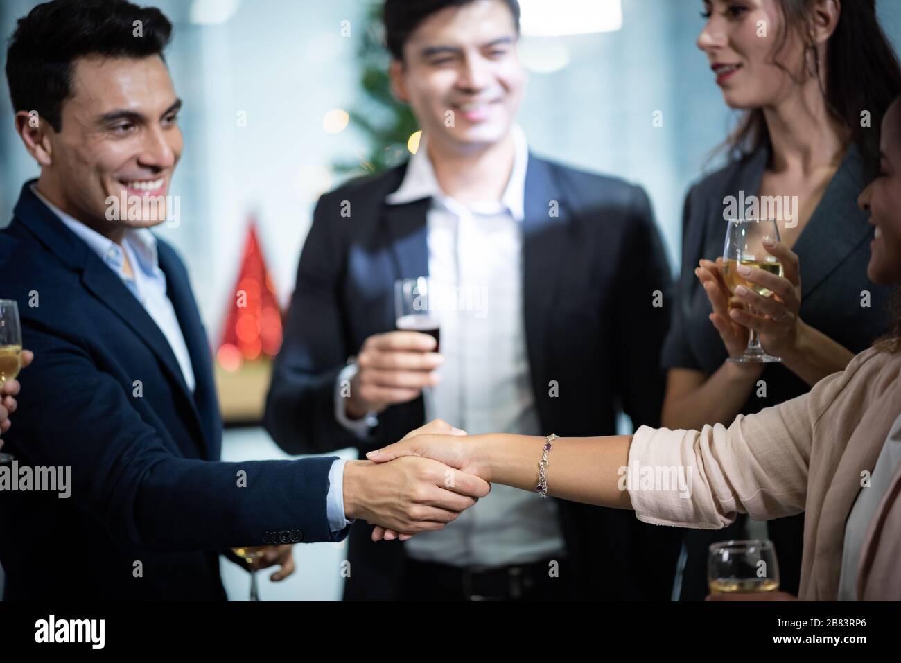 Business cooperation A group of business people showing cooperative ...