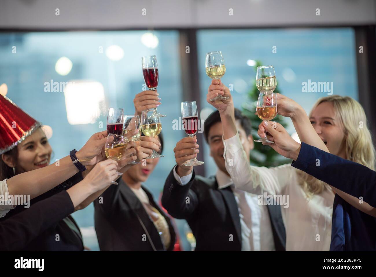 Business people drink wine At a party celebrating business success ...