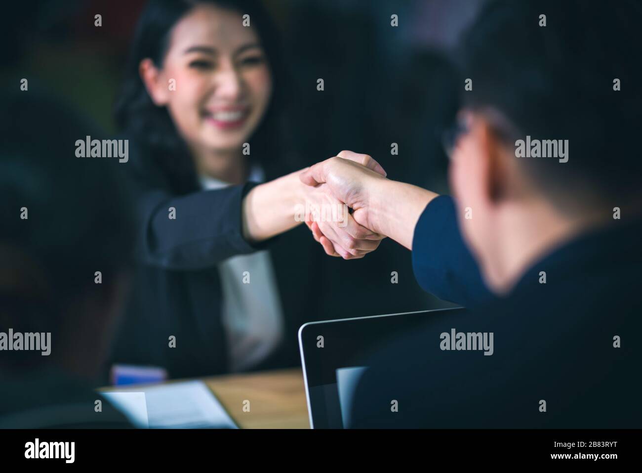 Business cooperation A group of business people showing cooperative ...