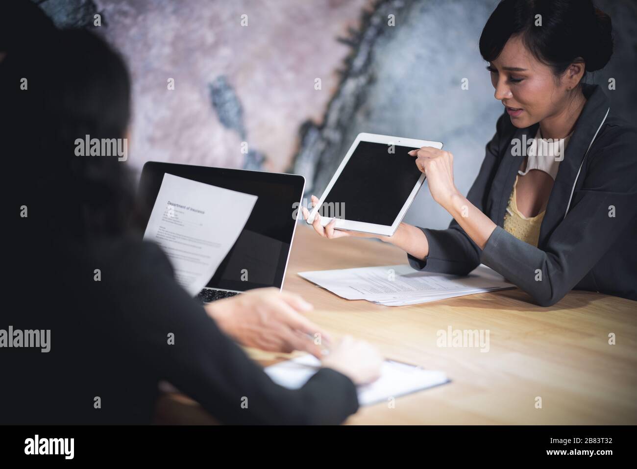 Successful job interview with boss and employee Stock Photo - Alamy