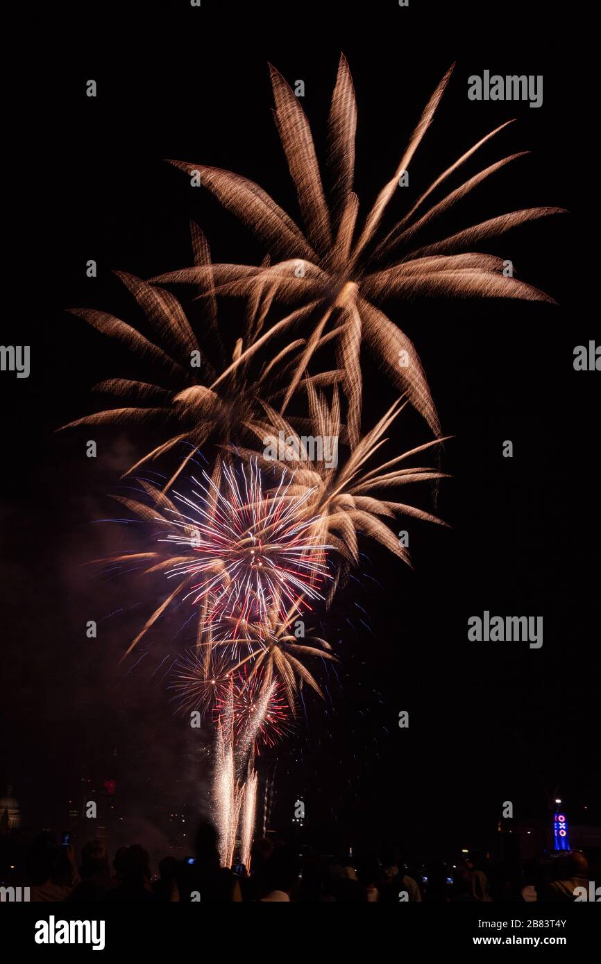 Multi-colored fireworks display in portrait image mode during Thames ...