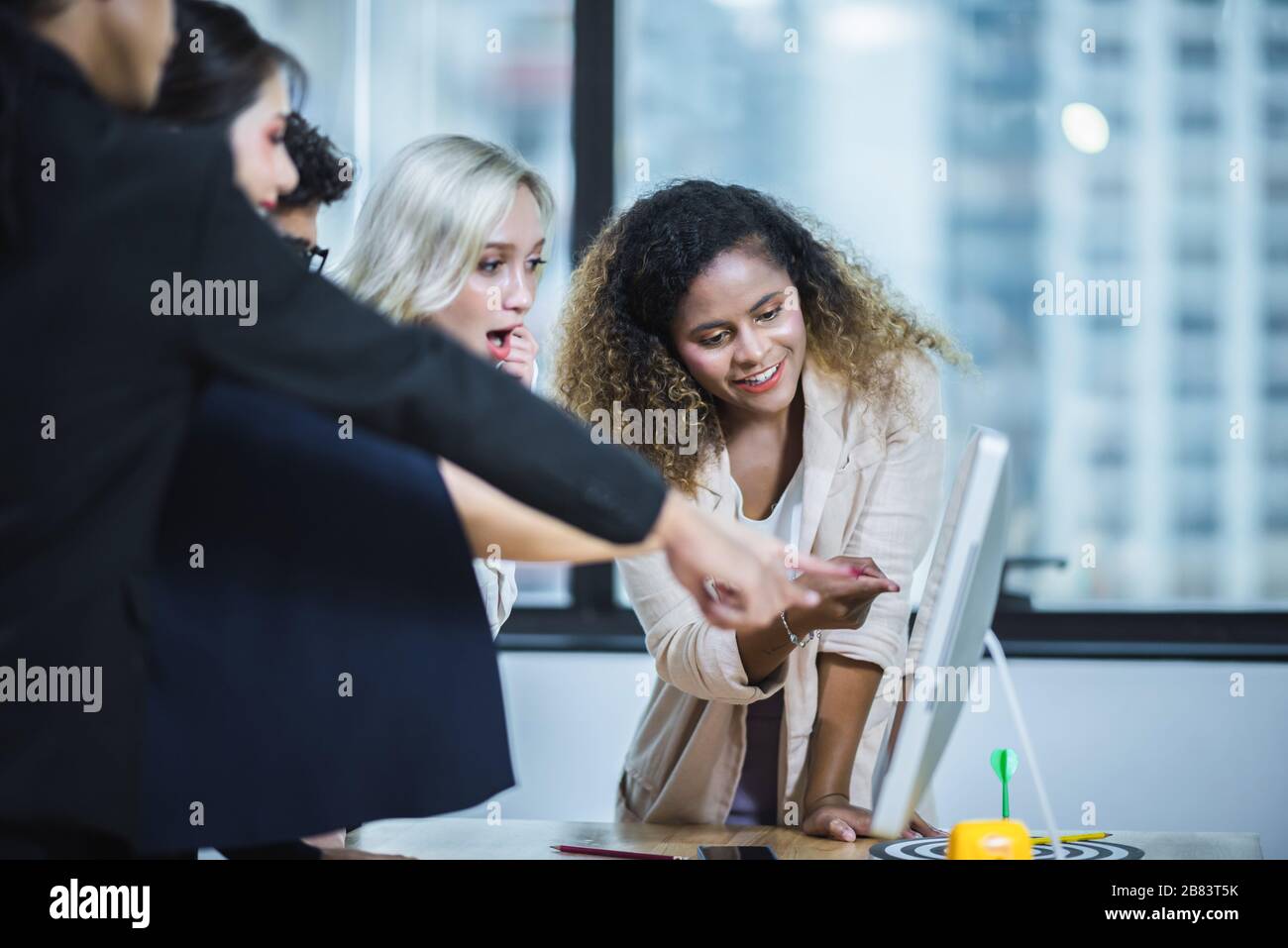 Business cooperation A group of business people showing cooperative ...