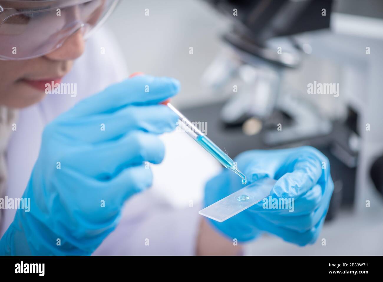 Using a microscope for research in the laboratory, Modern technology ...