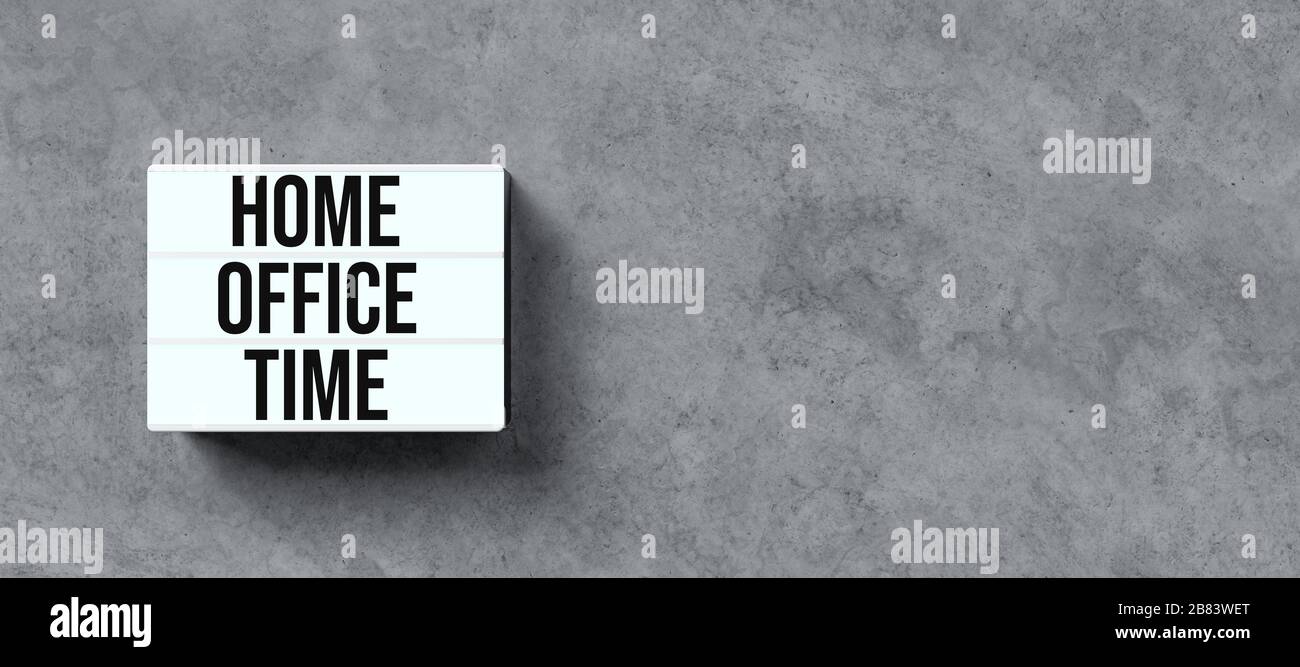 lightbox with text HOME OFFICE TIME in front concrete wall - 3D ...