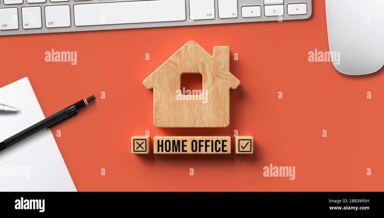 house symbol and wooden blocks with text HOME OFFICE on orange ...