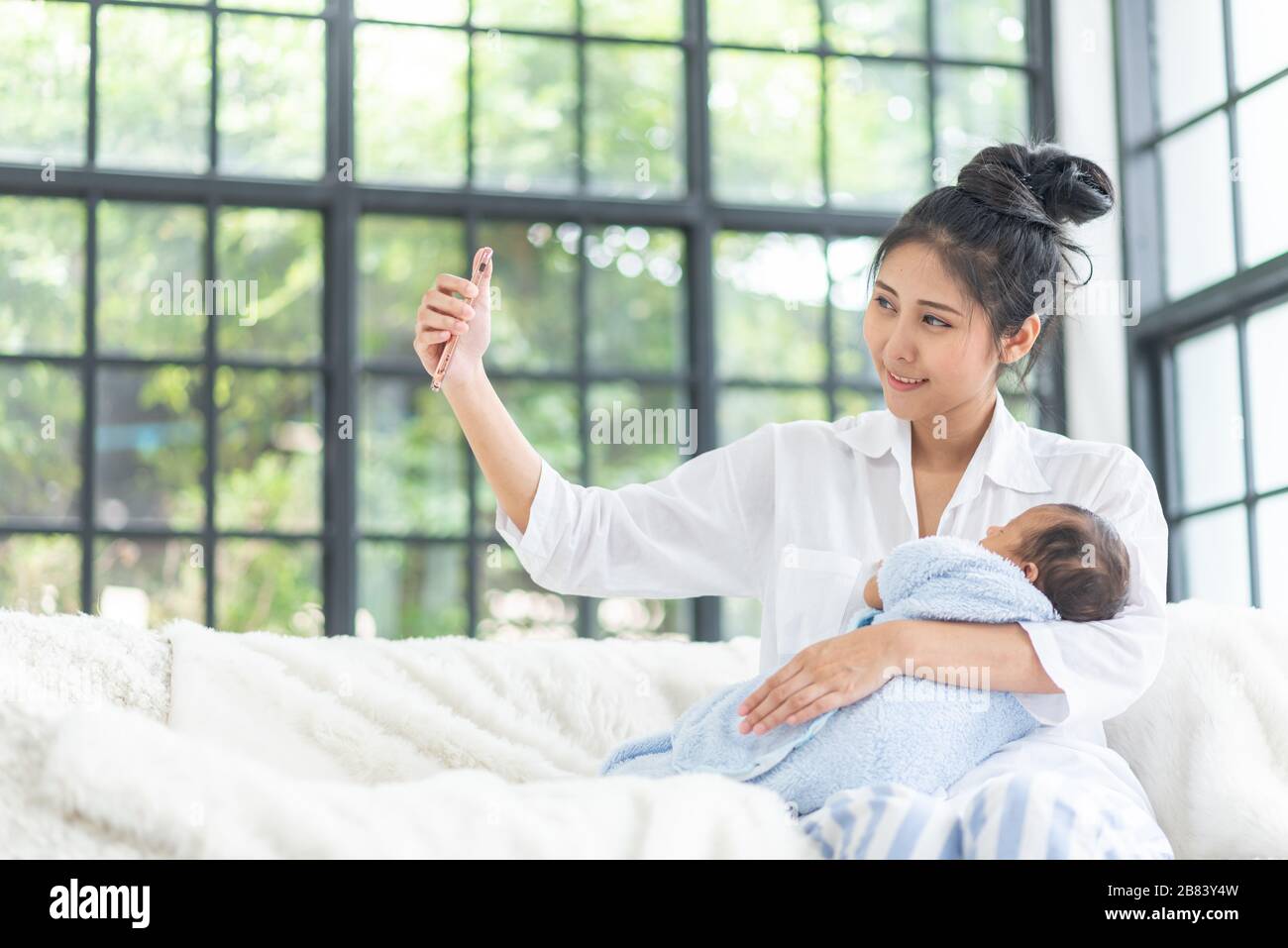 Relationship between mother and baby infant Stock Photo - Alamy