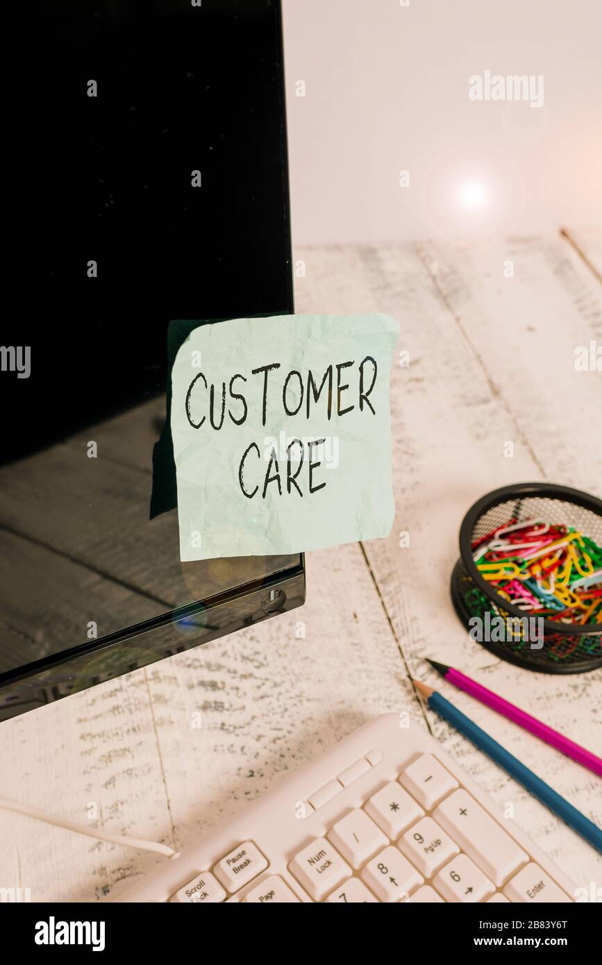 Writing note showing Customer Care. Business concept for process of ...