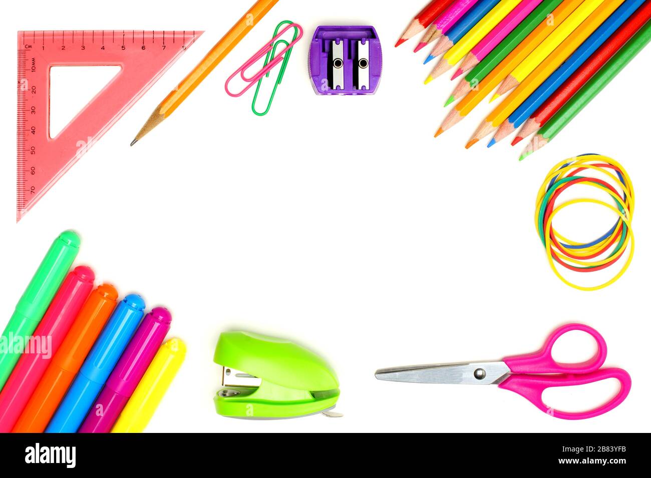 Colorful school supplies frame over a white background Stock Photo - Alamy