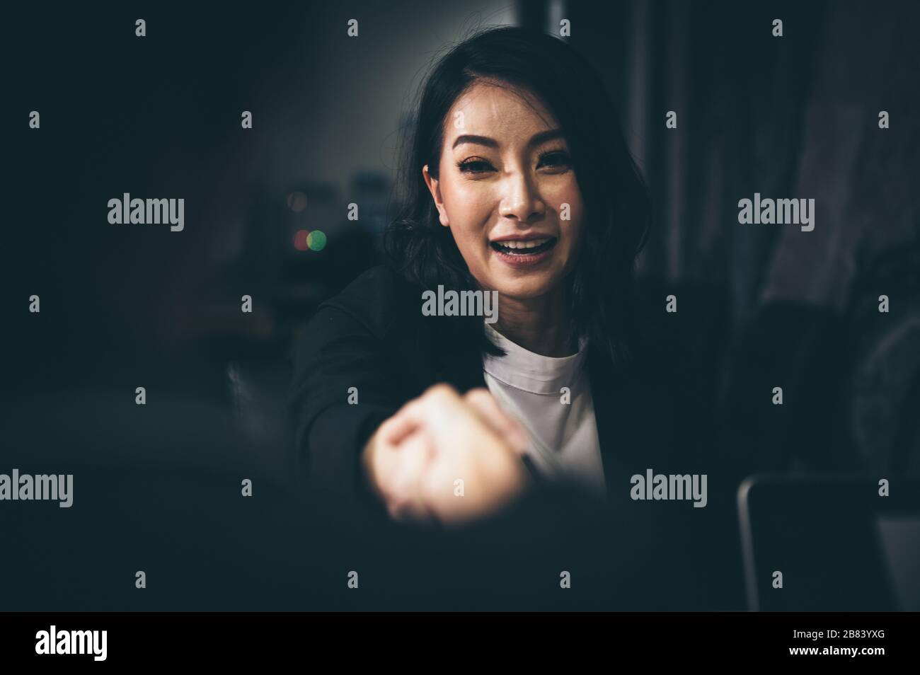 Business people shake hands Symbols of business cooperation Stock Photo ...