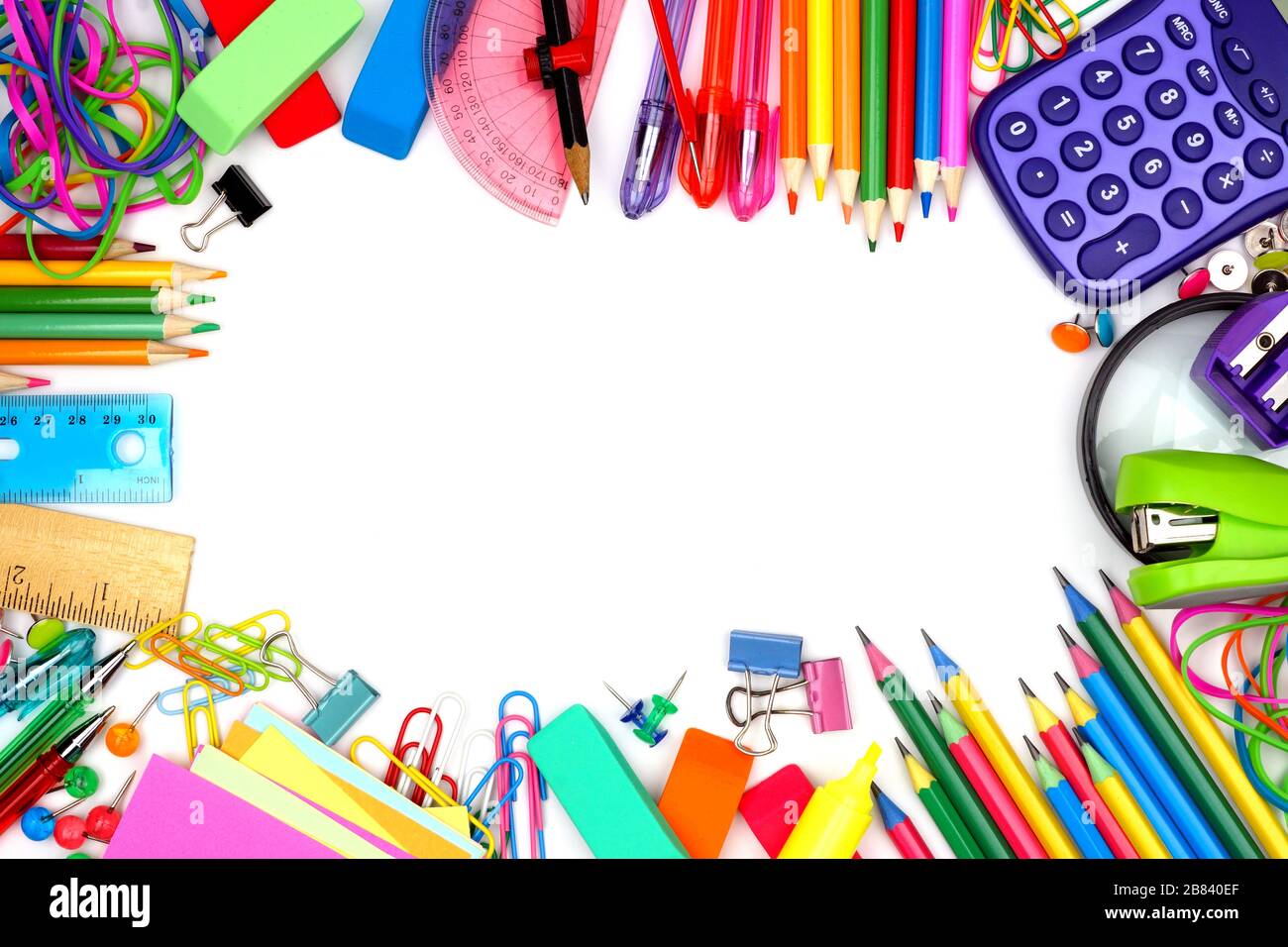 Colorful school supplies frame against a white background Stock Photo ...