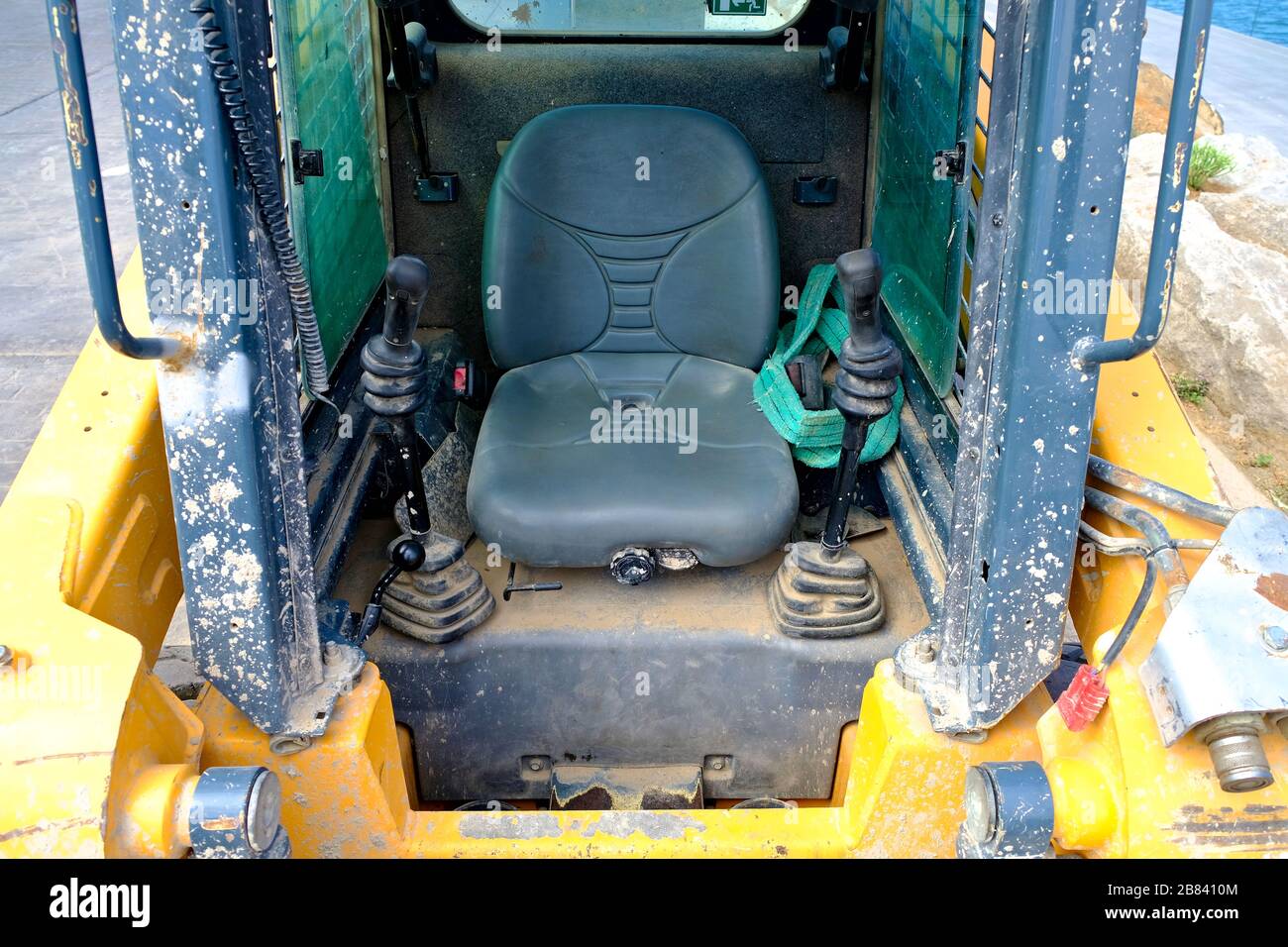 Operator seat, heavy construction machinery at a building site Stock ...