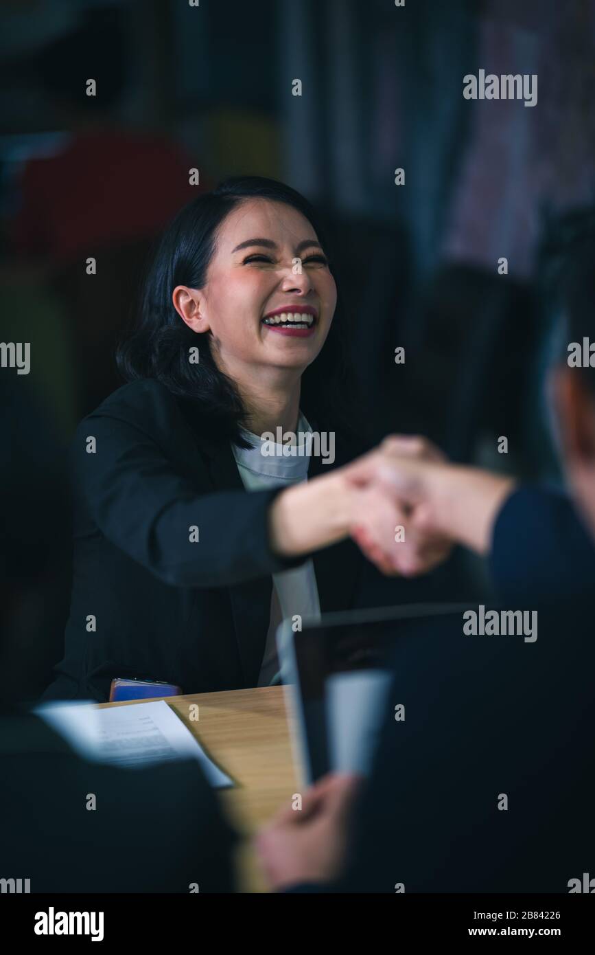 Successful job interview with boss and employee handshaking Stock Photo ...