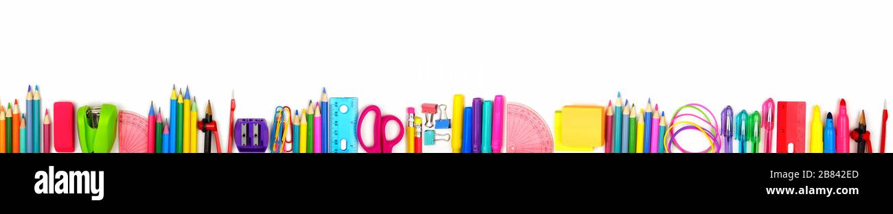 School supplies long bottom border. Top view isolated on a white ...