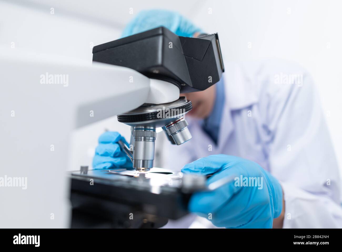 Doctors are diagnosed in the laboratory. With microscopy Stock Photo ...