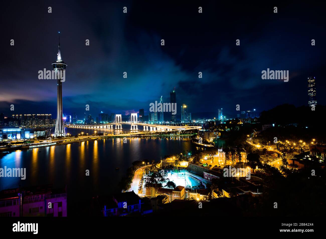 Macau cityscape at night, all hotel and tower are colorful lighten up ...